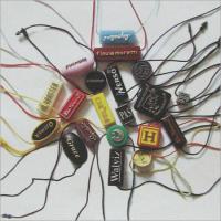 China custom plastic hang tags garment seal tags plastic tag on clothes manufacturer for sale