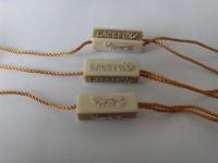 China custom wholesale garment plastic hang tag manufacturer with emboss black logo for sale
