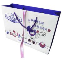 China Bespoke Recycled Paper Shopping Clothing Bag with Embossed Hot Stamping Logo for sale