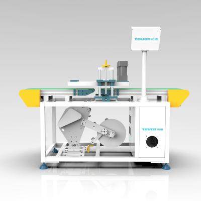 China High Precision Automatic Garment Labeling Machine PLC Control With Stainless Steel Construction for sale
