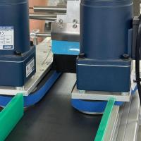 China High Precision Automatic Garment Labeling Machine PLC Control With Stainless Steel Construction for sale