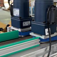 China High Precision Automatic Garment Labeling Machine PLC Control With Stainless Steel Construction for sale
