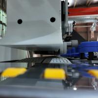 China Automatic SPC Flooring CNC Profile Bending Machine High Precision Rigid Core Forming System for sale