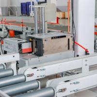 China Automatic Packaging Machine with Labeling System for Square LVT SPC Flooring Manufacturing Factory for sale