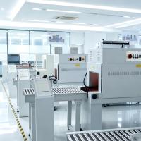 China 0–5 Packs/Min Heat Shrink Film Machine 20KW For SPC Flooring / Panel Packaging for sale