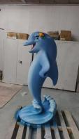 China Custom Cartoon Dolphin Fiberglass Sculpture with Wave Base - Weather-Resistant FRP Sculpture for Theme Parks for sale