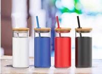 China glass bottle with bamboo lid for sale