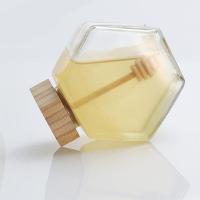 China Empty Wooden Jar Lid 100ml 200ml 500g Hexagon Honey Jar With Dipper for sale