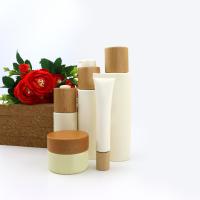 China Custom Round Cosmetic Bottle Caps Non Spill Cream Bottle Wooden Lid for sale