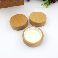 China Custom Round Cosmetic Bottle Caps Non Spill Cream Bottle Wooden Lid for sale