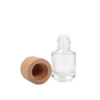 China Modern Beech Wood Perfume Bottle Lid Printing Logo Essential Oil Bottle Cap for sale