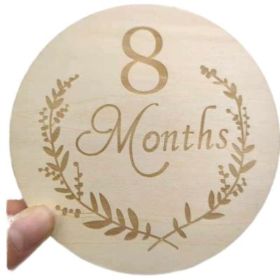 China 13-Piece Newborn Baby Monthly Milestone One-Sided Laser Cut Folk Art Wood Stand for Photographs Home Decor Pattern for sale