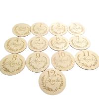 China 13-Piece Newborn Baby Monthly Milestone One-Sided Laser Cut Folk Art Wood Stand for Photographs Home Decor Pattern for sale