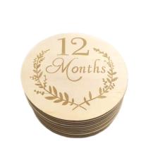China 13-Piece Newborn Baby Monthly Milestone One-Sided Laser Cut Folk Art Wood Stand for Photographs Home Decor Pattern for sale