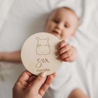 China Newborn Baby Shower Gift customized laser-cut cartoon animal monthly wooden baby milestone for sale