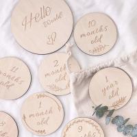 China Wood Customize Baby Monthly Milestone Card Wooden Double Sided Laser Engrave Discs Craft Cards with Drawstring Bag for sale