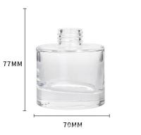 China 100ML Round shaped Reed Diffuser Glass Bottles with Beech wooden round lid for living Room for sale