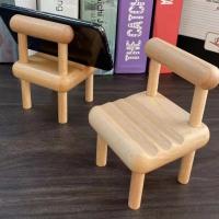 China New wooden chair beech mobile phone holder creative small stool holder desktop  mobile phone holder for lazy people for sale