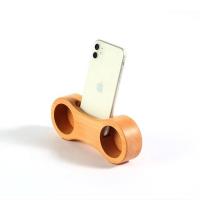 China Cell Phone Stand with Speaker Sound Amplifier Novelty Cell Phone Holder for Desk Portable Phone Holder for sale