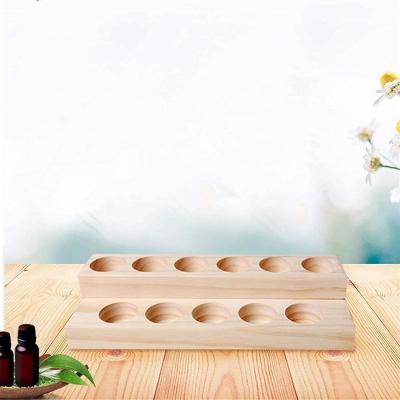 China Wholesale Wooden Presentation Display Rack Stand Holder for Essential Oils Home Decoration Hanging Storage Organizer for sale