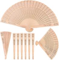 China Custom Chinese Carved Folding Fragrance Wood Hand Fan Hotel Wedding Fan for sale
