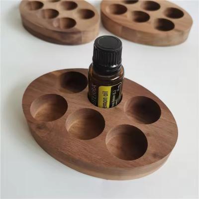 China Customized wooden essential oil stand display stand for sale