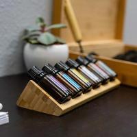 China Wooden Essential Oils Storage Racks Essential Oils Perfume Storage Shelf for sale