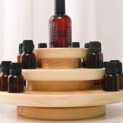China Customized high-quality 3-layer wooden perfume essential oil display rack storage rack for sale