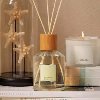 China Customized round spiral wood cover glass bottle aromatic reed diffuser sustainable packaging for sale