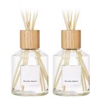China Customized round spiral wood cover glass bottle aromatic reed diffuser sustainable packaging for sale