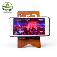 China Exquisite carved wooden mobile phone holder  cell phone stand for sale