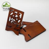 China Exquisite carved wooden mobile phone holder  cell phone stand for sale