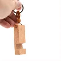China Multifunctional Wooden Mobile Phone Holder Key Ring Fashion Simple for sale