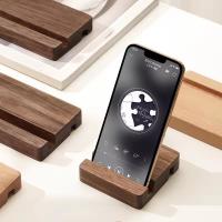 China Wood Cell Phone Stand Wooden Mobile Phone Holder Universal Portable Desktop Smartphone Stand for sale