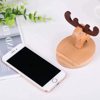 China Natural Wooden Cell Phone Stand, Ecofriendly Smartphone Holder, Cute Cartoon Deer Office Mobile Phone Base for sale