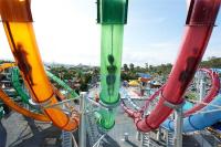 China 4 Lanes Extreme AquaLoop Water Slide with 17m Height and 60 km/h Speed - Translucent Fiberglass Construction for sale