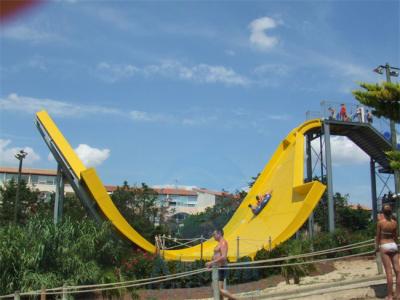 China Banana Shape Water Park Slide Multicolour 12 Meters Pendulum Water Slide for sale