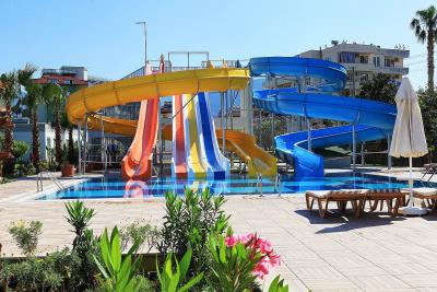 China Aqua Theme Park Swimming Pool Games Rides Fiberglass Water Slide For Adults for sale