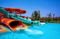China Affordable Swimming Pool Slides 5-12 Meters Slide Height 10-12mm Fiberglass Thickness for sale