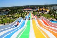 China Commercial Large Water Park Equipment Lake Water Slide With Hot Dipped Galvanized Steel Structures And Roofs for sale