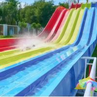 China Fiberglass Rainbow Racing Slide Water Park Equipment Swimming Pool Slide Over 3 Lane For Adult Water Game 100KG Capacity for sale