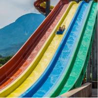 China Fiberglass Rainbow Racing Slide Water Park Equipment Swimming Pool Slide Over 3 Lane For Adult Water Game 100KG Capacity for sale