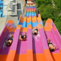 China Commercial Rainbow Multi-Lane Racing Water Slide Heavy-Duty Fiberglass  Anti-UV For Water Parks And Resorts for sale