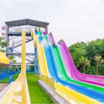 China 4 Lane Racing Rainbow Slide Fiberglass Adult Customized Water Park Equipment for Commercial Amusement Parks Sale for sale
