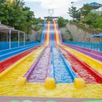 China 4 Lane Racing Rainbow Slide Fiberglass Adult Customized Water Park Equipment for Commercial Amusement Parks Sale for sale