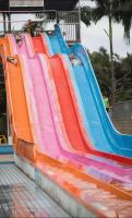 China 4 Lane Racing Rainbow Slide Fiberglass Adult Customized Water Park Equipment for Commercial Amusement Parks Sale for sale