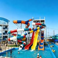 China Large Multi Lane High-speed and Spiral Fiberglass Water Slide for Commercial Aqua Park Equipment With Rohs for sale
