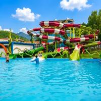 China Large Multi Lane High-speed and Spiral Fiberglass Water Slide for Commercial Aqua Park Equipment With Rohs for sale
