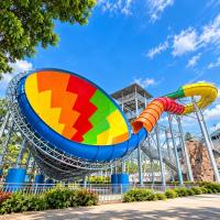 China Most Popular Tornado Funnel Water Slide Fiberglass Rainbow Color Water Ride For Water Parks Design for sale