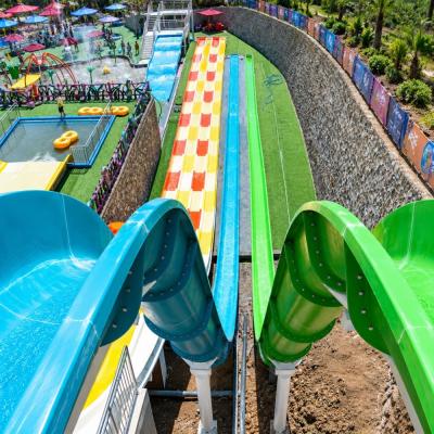 China Professional Multi Lane Rainbow Racer Fiberglass Water Slide For Aqua Park Project for sale